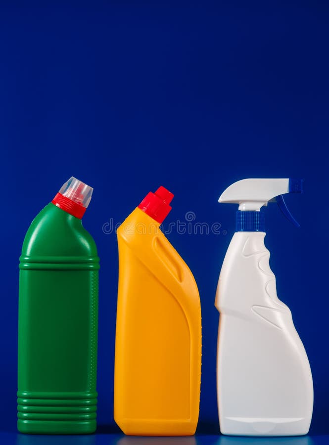Different Color Bottles with Detergent on a Blue Background Stock Photo ...