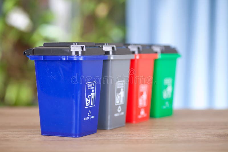 Four Different Color Garbage Bins Stock Photo - Image of environmental ...