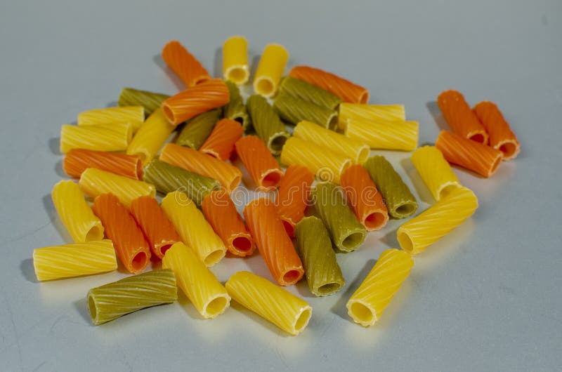 Different Color Pasta on a Gray Background Stock Photo - Image of ...