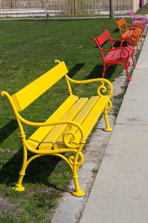 Colored Fench on the Street Stock Photo - Image of bench, green: 28474156