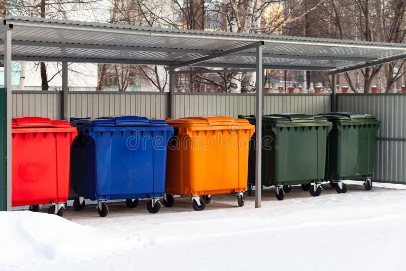 Different Colored Bins for Collection of Recycle Materials Stock Image ...