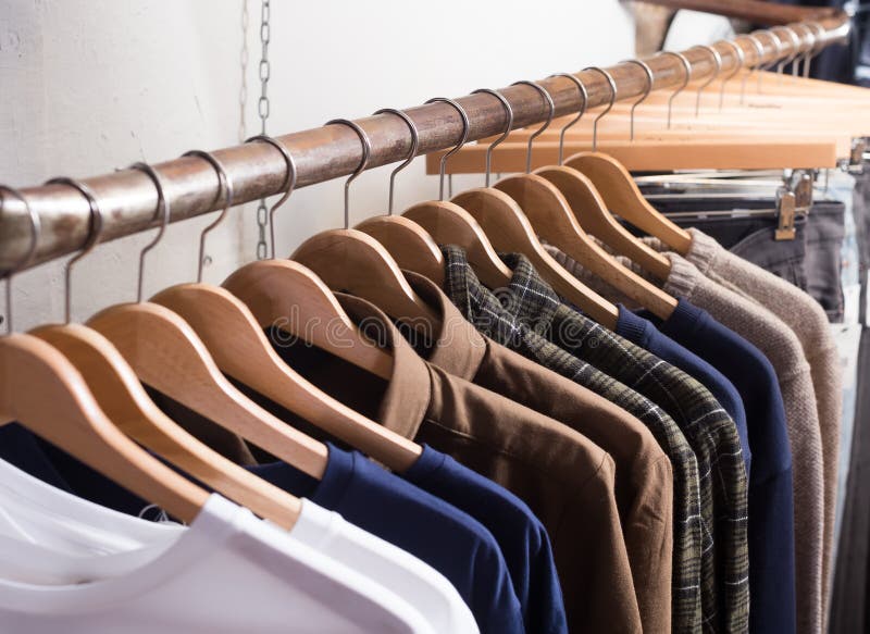 Different Colored Clothes in the Modern Shop Stock Photo - Image of ...