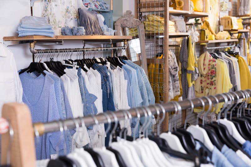 Different Colored Clothes in the Modern Shopping Centre Stock Image ...