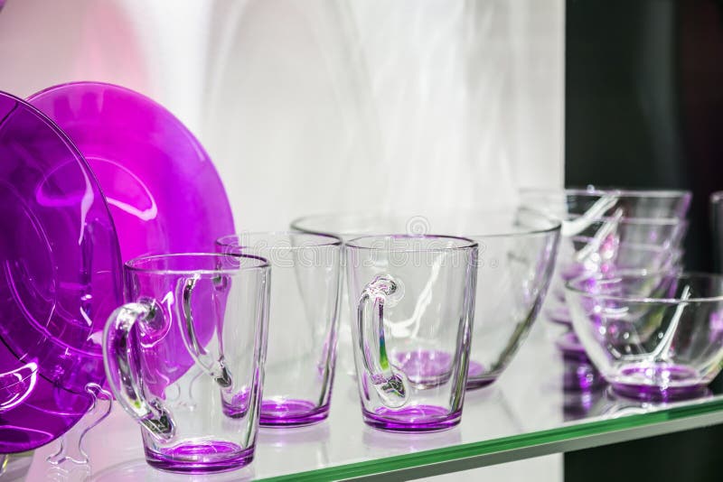 Different-colored Glass Cups, Plates and Saucers Stock Photo - Image of ...