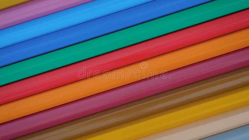 Different Colored Pencils on Rotating Surface - Close Up, Top View ...