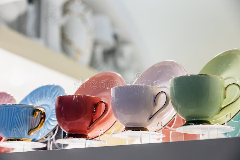 Different-colored Porcelain Cups are on the Counter Stock Photo - Image ...