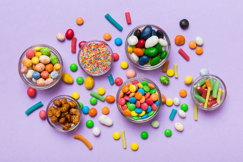 Different Colored Round Candy in Bowl and Jars. Top View of Large ...