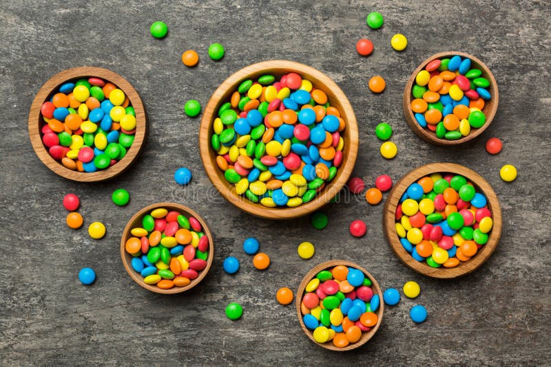 Different Colored Round Candy in Bowl and Jars. Top View of Large ...