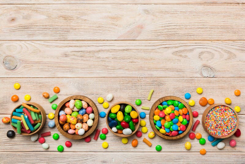 Different Colored Round Candy in Bowl and Jars. Top View of Large ...