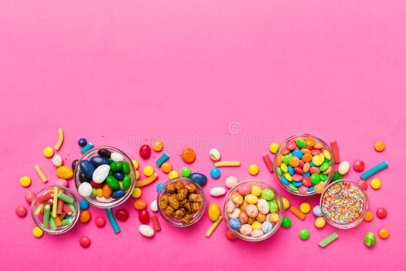 Different Colored Round Candy in Bowl and Jars. Top View of Large ...