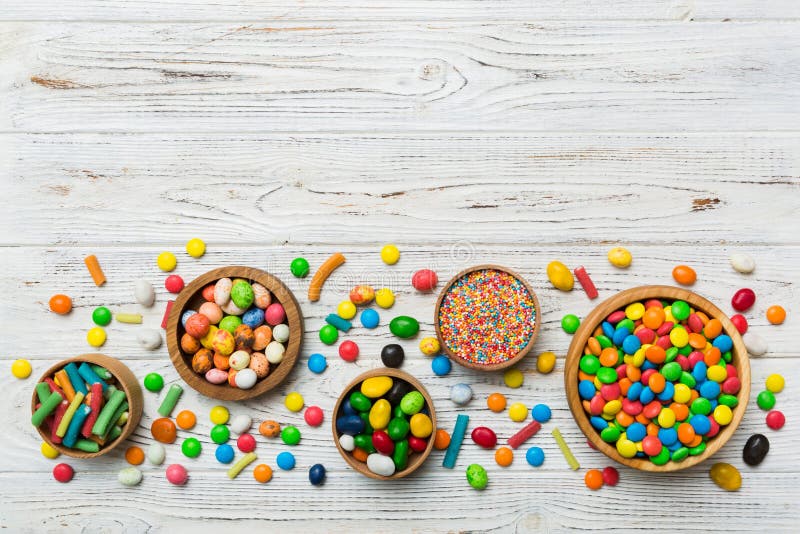 Different Colored Round Candy in Bowl and Jars. Top View of Large ...