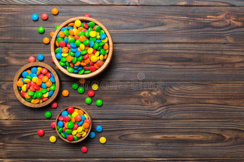 Different Colored Round Candy in Bowl and Jars. Top View of Large ...