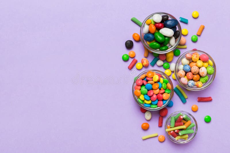 Different Colored Round Candy in Bowl and Jars. Top View of Large ...