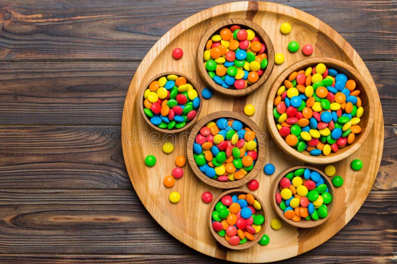 Different Colored Round Candy in Bowl and Jars. Top View of Large ...