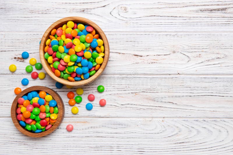 Different Colored Round Candy in Bowl and Jars. Top View of Large ...