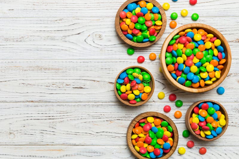 Different Colored Round Candy in Bowl and Jars. Top View of Large ...