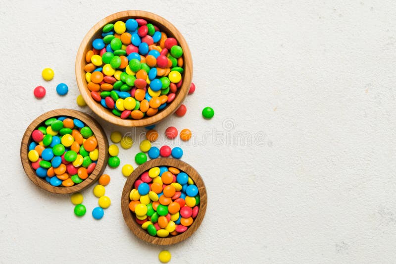 Different Colored Round Candy in Bowl and Jars. Top View of Large ...