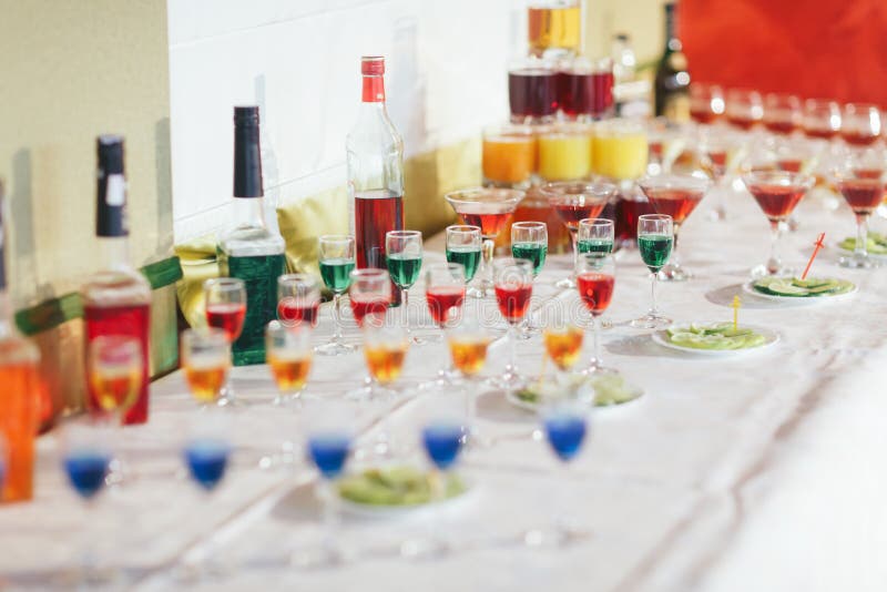 Different Colored Shots Stand on the Table with Alcohol Stock Image ...