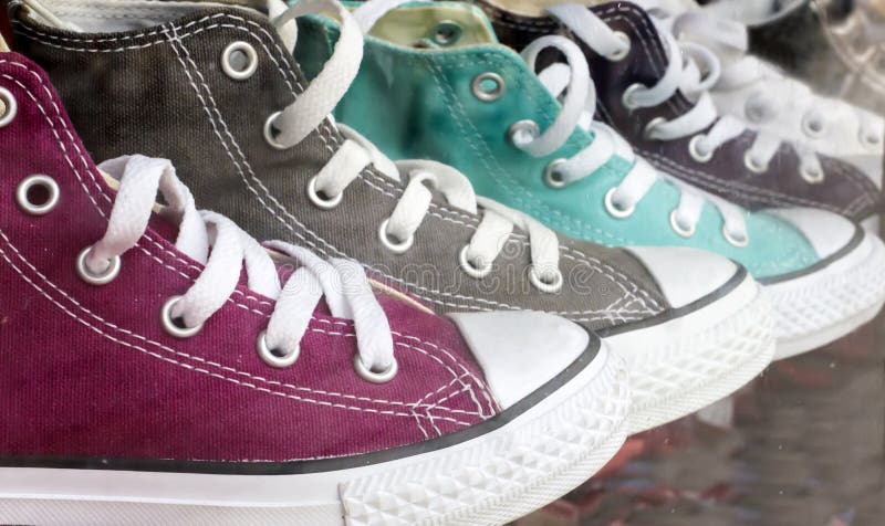 Different Colored Sneakers in Line Stock Photo - Image of casual, sole ...
