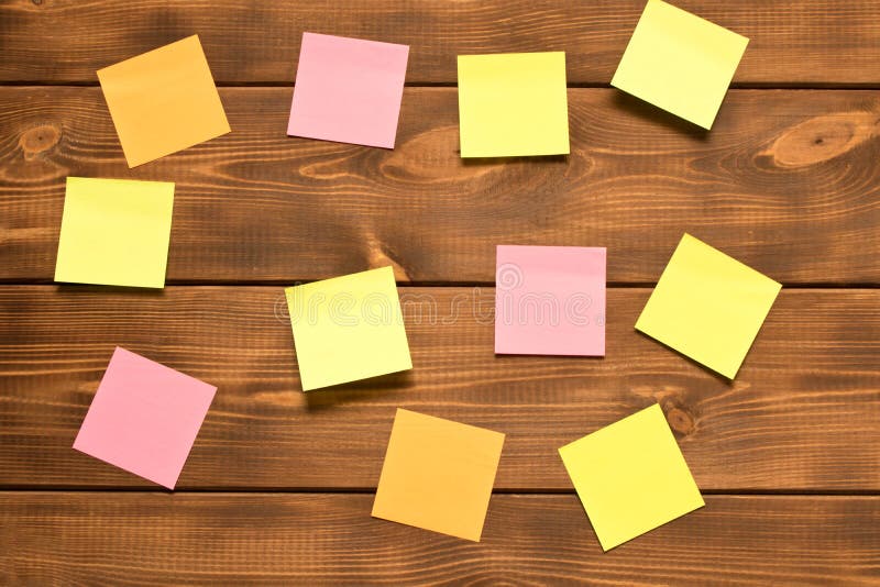 Different Colored Stickers on a Wooden Background Stock Photo - Image ...