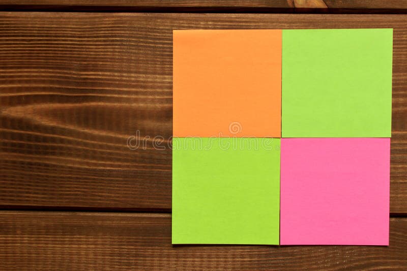 Different Colored Stickers on a Wooden Background. Empty Text Space ...