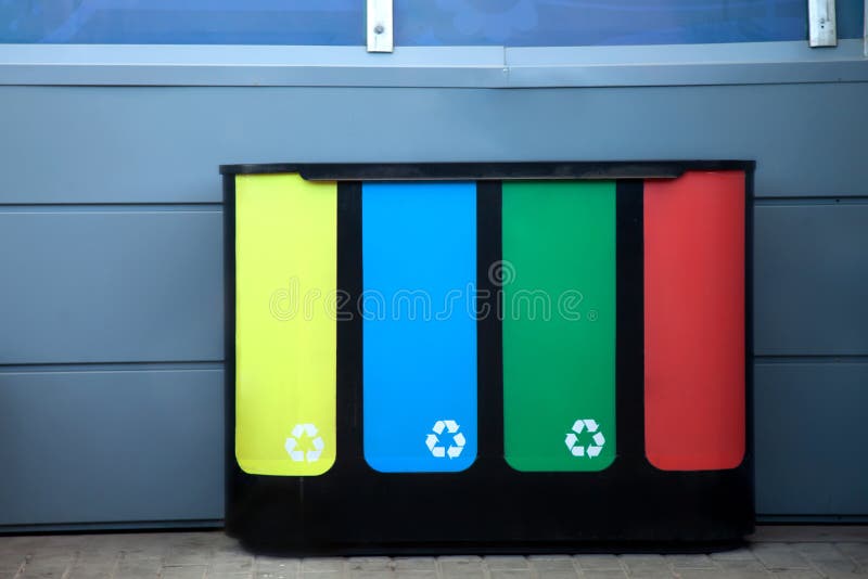 Different Colored Trash Containers for Garbage Separation with Sign ...