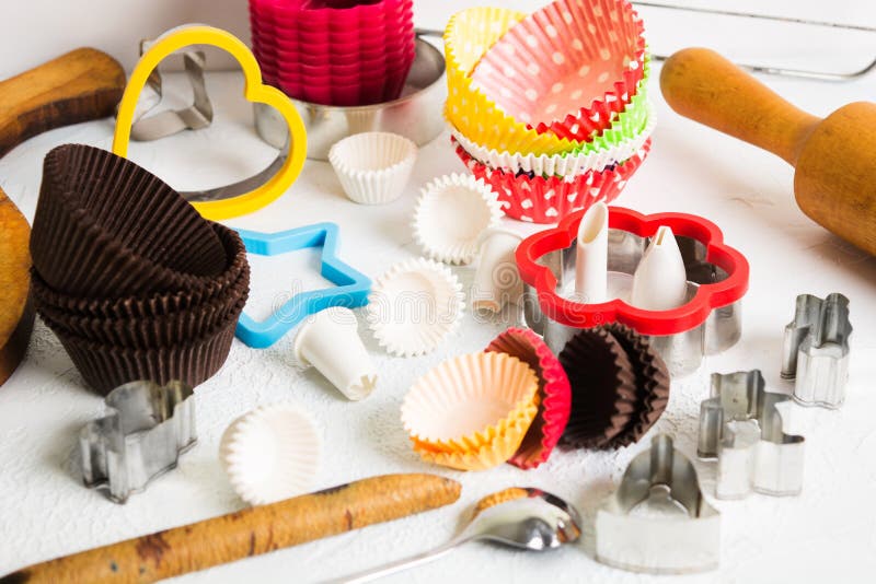Different Colorful Baking Shapes, Cutters and Tools Over White T Stock ...