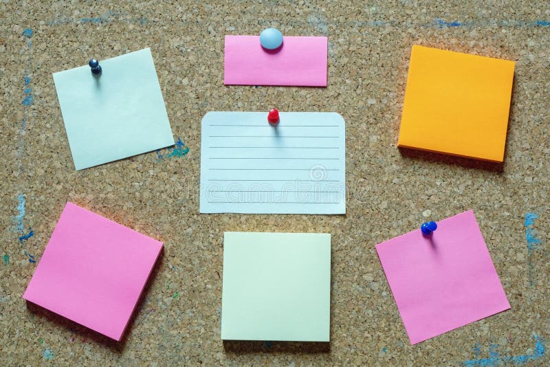Different Colorful Post it Notes on Old Cork Board. Copy Space Stock ...