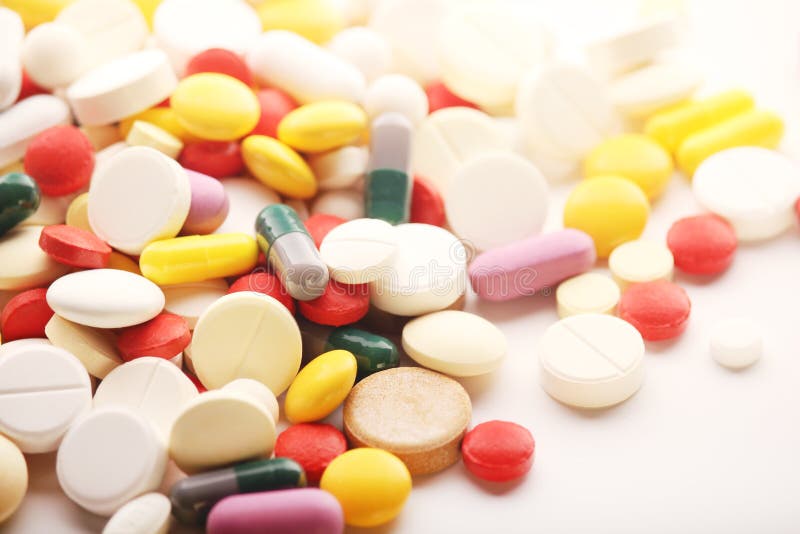 Different Colorful Tablets at White Background Stock Image - Image of ...