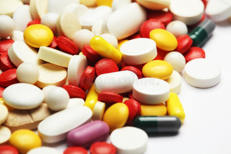 Different Colorful Tablets at White Background Stock Photo - Image of ...