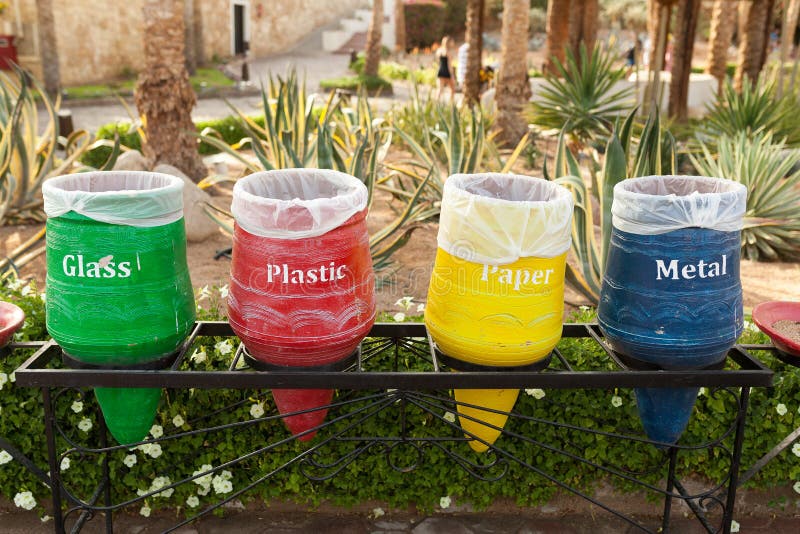 Different Colors Bins for Collect Recycle Materials Stock Photo - Image ...