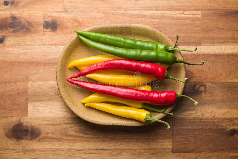 Different Colors Chilli Peppers. Stock Photo - Image of pepper ...