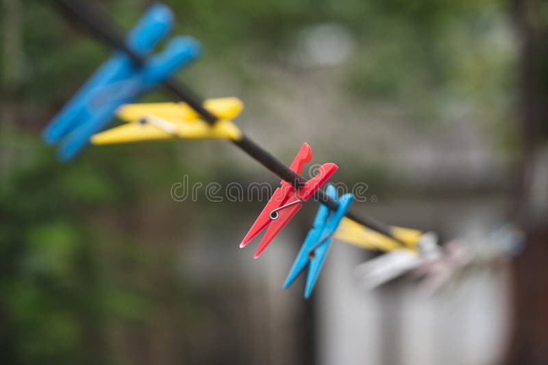 Different Colors of Clothespins for Washed Clothes on a String Stock ...