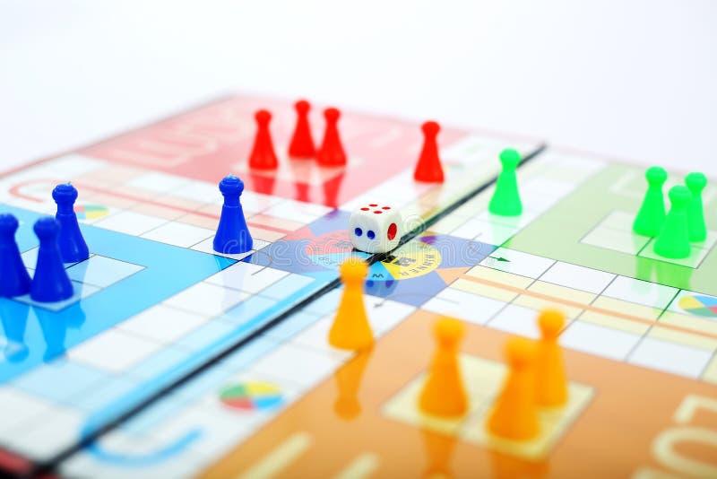 Different Colors Ludo Tokens and Dice on the Ludo Game Stock Image ...