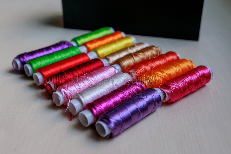 Different Colors of Silk Thread Rolls Used for Embroidery Work and ...