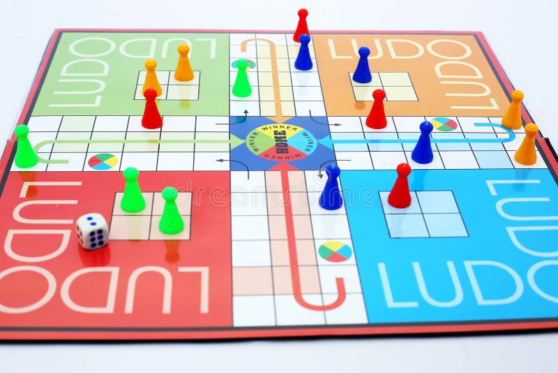 Different Colors Ludo Tokens and Dice on the Ludo Game Stock Image ...
