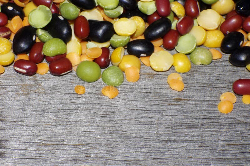 Different Coloured Beans on Wooden Background Stock Photo - Image of ...