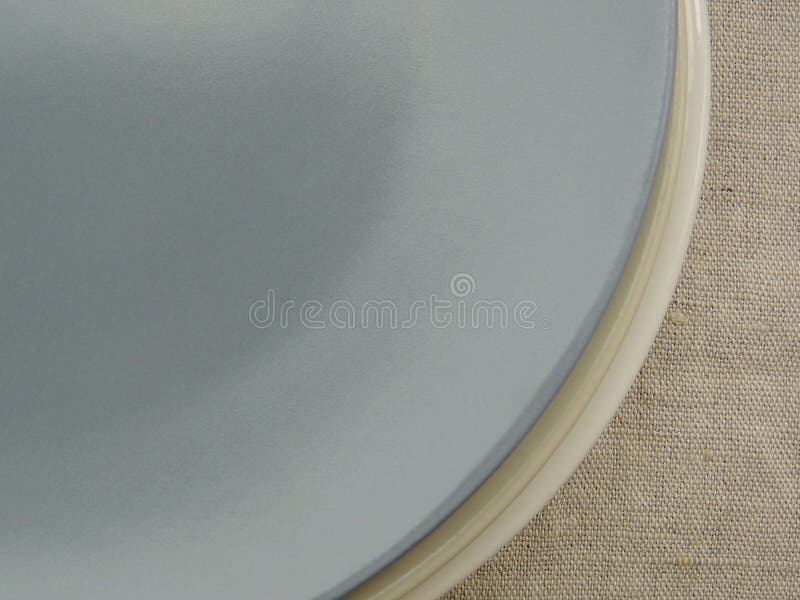 Different Colours Round Plates on Linen Fabric Background. Stock Image ...