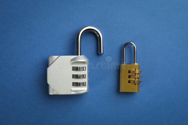 Different Combination Locks on Blue Background, Flat Lay Stock Photo ...