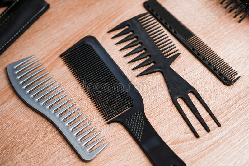 Different Combs on the Table in the Barbershop Stock Photo - Image of ...