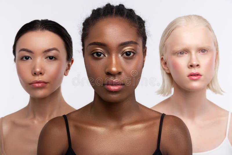 Three Women with Different Complexion Posing Together Stock Image ...