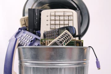 Different Computer Parts in Trash Can Stock Photo - Image of disk ...