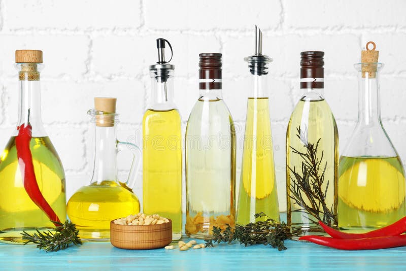 Different Cooking Oils on Blue Table Stock Image - Image of kitchen ...