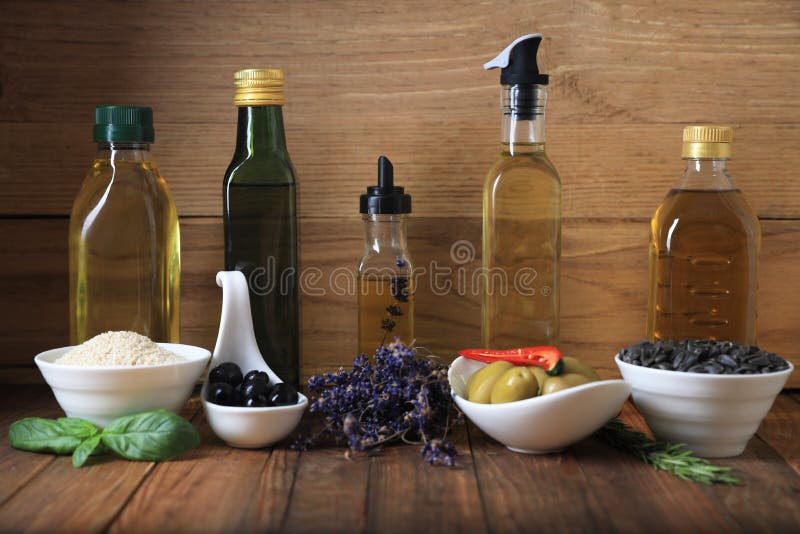 Different Cooking Oils and Ingredients on Wooden Table Stock Image ...