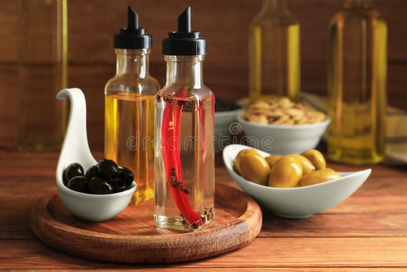Different Cooking Oils and Ingredients on Wooden Table Stock Photo ...