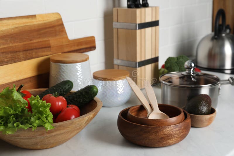 Different Cooking Utensils and Fresh Vegetables on Countertop in ...