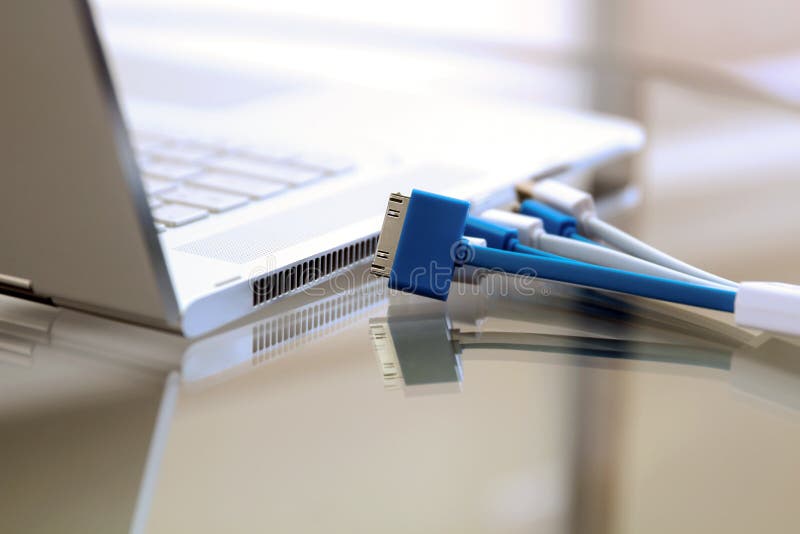 Different Cords and Cables Plugged into a Modern Laptop Computer Stock ...