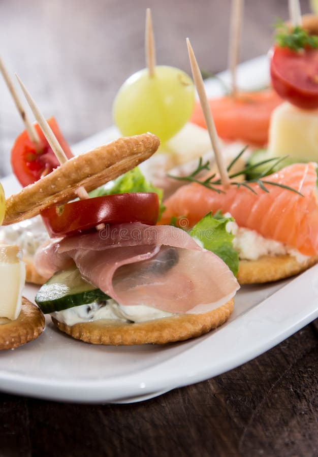 Different Crackers on a Plate Stock Photo - Image of grapes, tasty ...