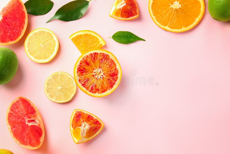 Different Cut Citrus Fruits on Color Background, Top View Stock Image ...