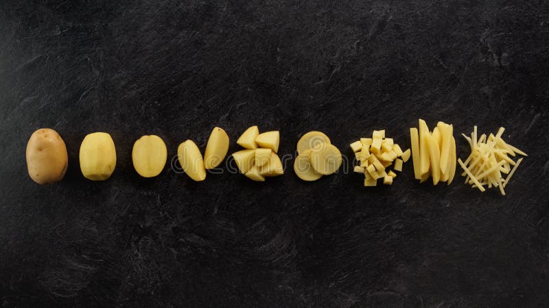 Different Cuts of Potatoes on a Black Textured Background Stock Photo ...